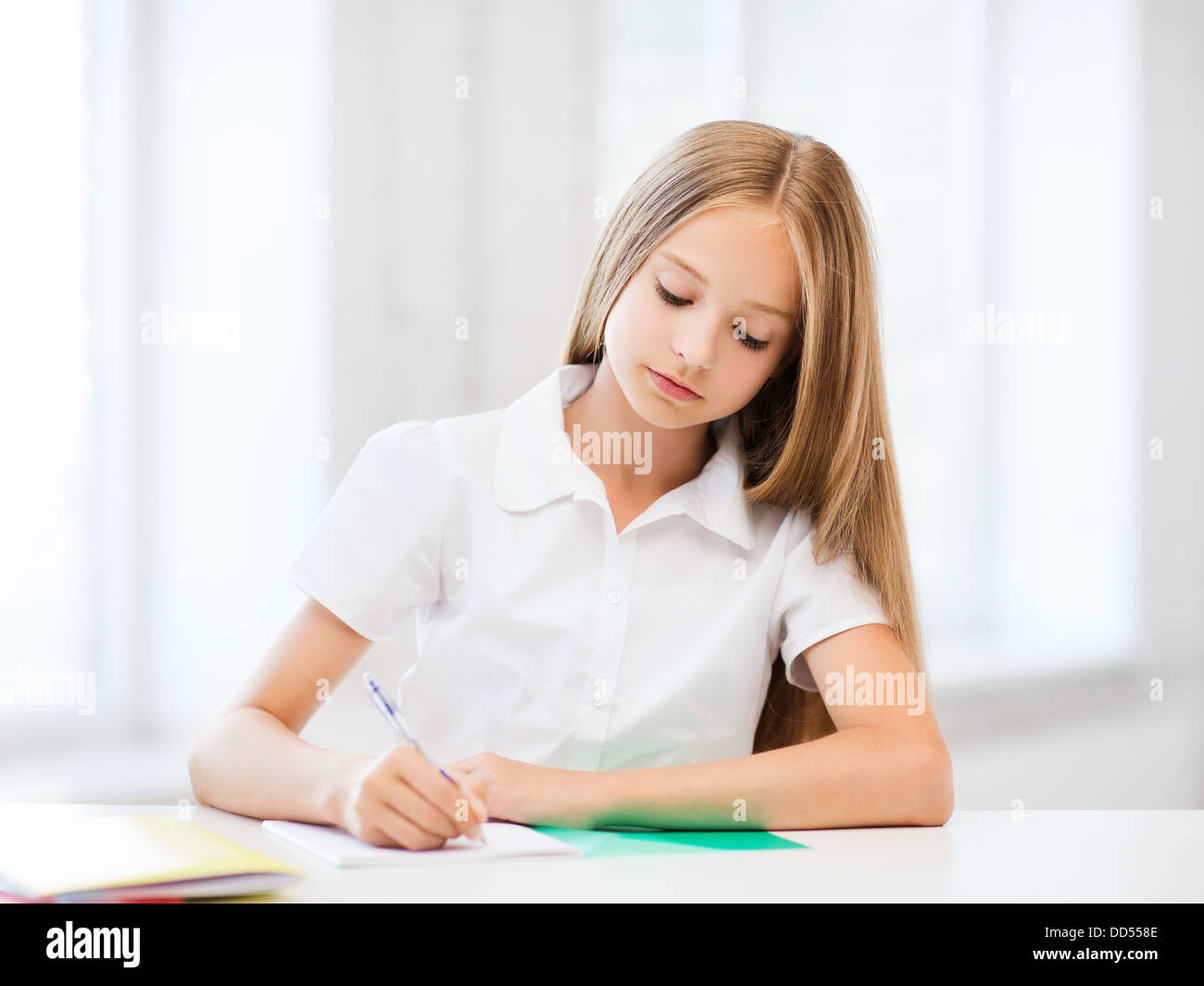 student girl studying at school Stock Photo - Alamy