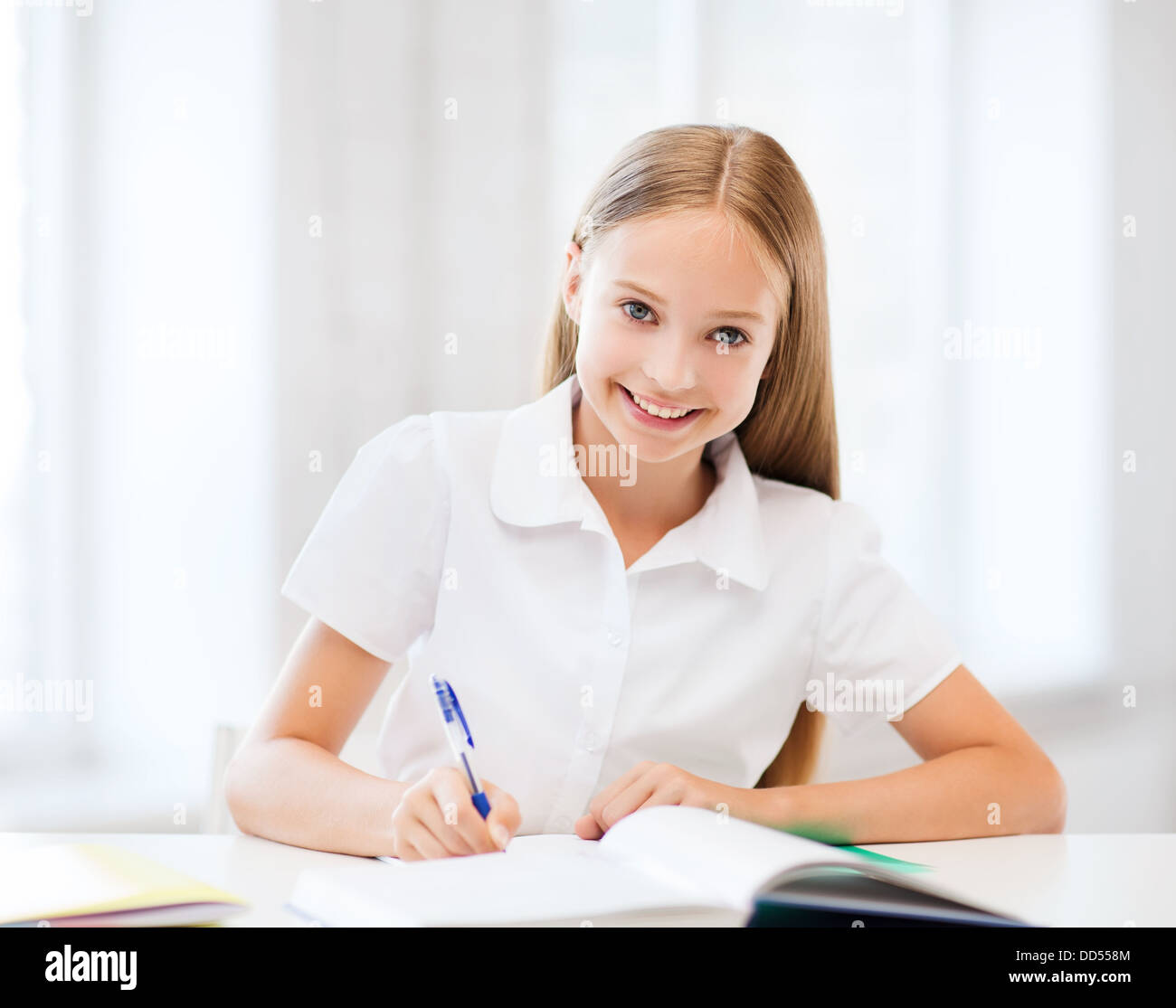 student girl studying at school Stock Photo - Alamy