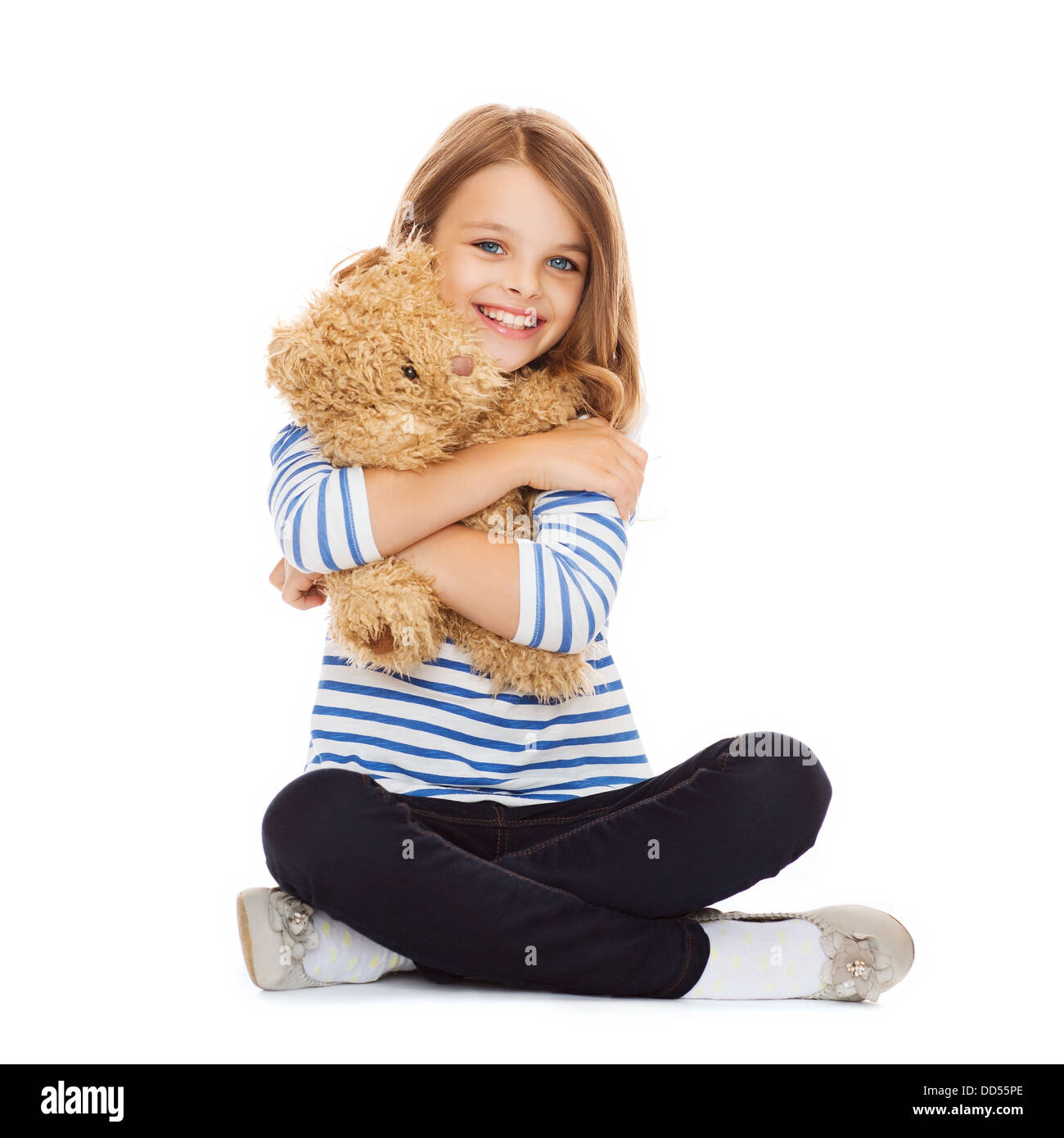 cute little girl hugging teddy bear Stock Photo - Alamy