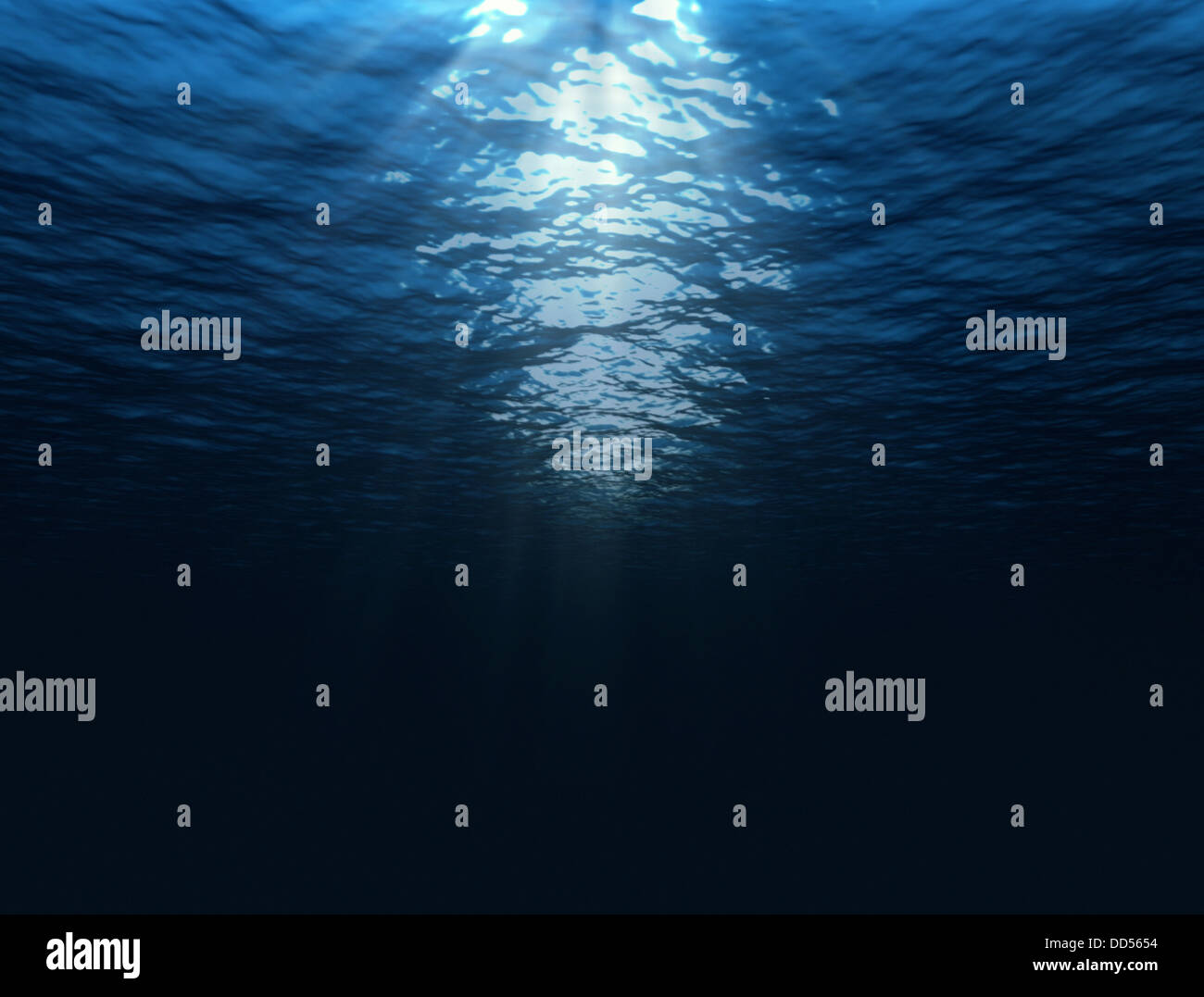 dark blue under water image with sun rays Stock Photo - Alamy