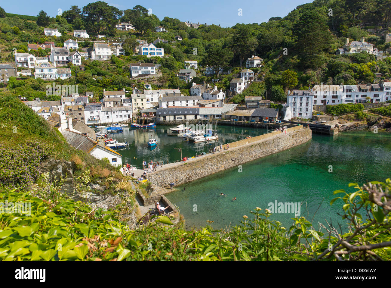 Polperro harbour Cornwall with beautiful blue green sea and sky in the ...