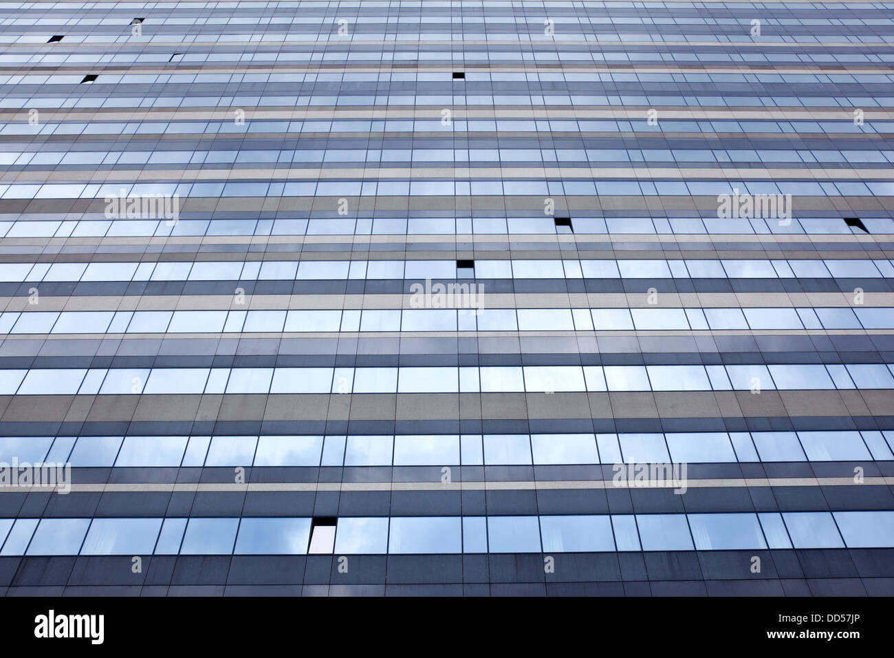 modern facade with open windows reflecting sky Stock Photo - Alamy