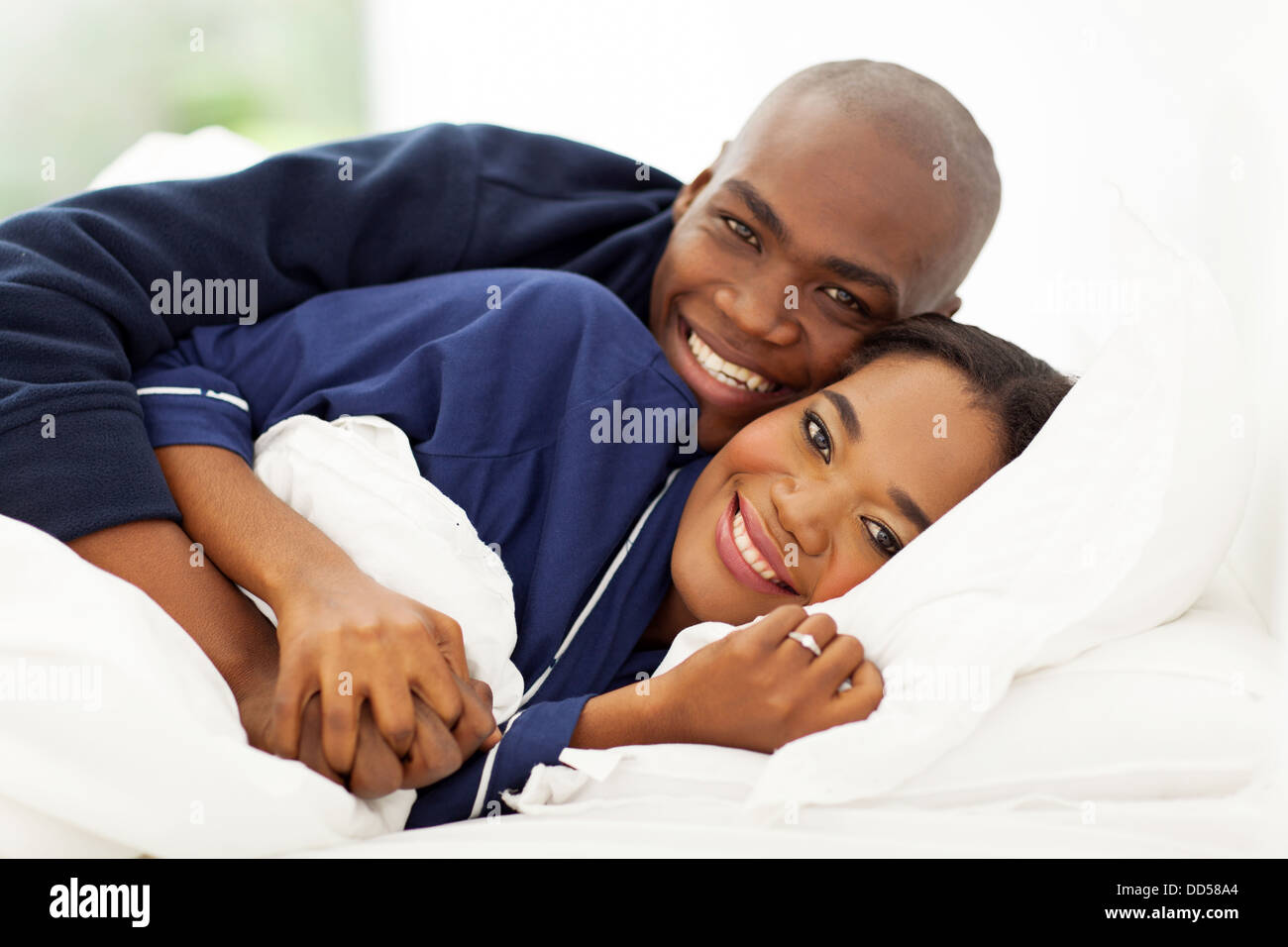 Lovers in bed hi-res stock photography and images - Alamy