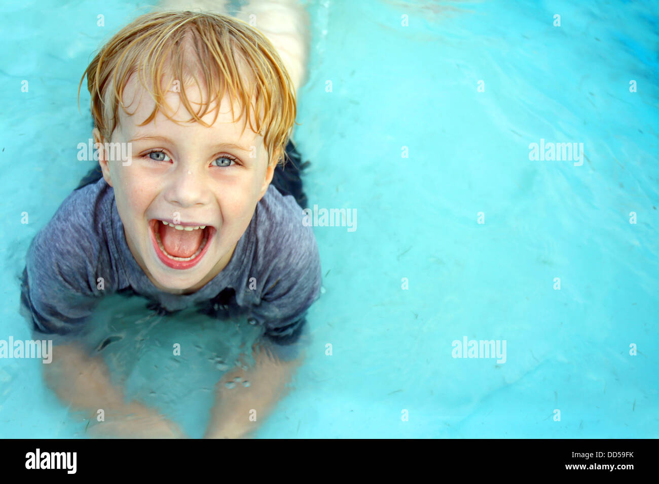 Laying by the pool hi-res stock photography and images - Alamy