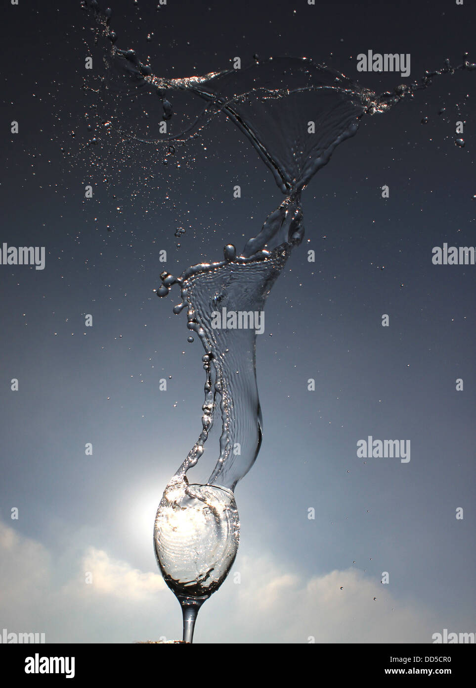 Water splashing from wine glass Stock Photo - Alamy