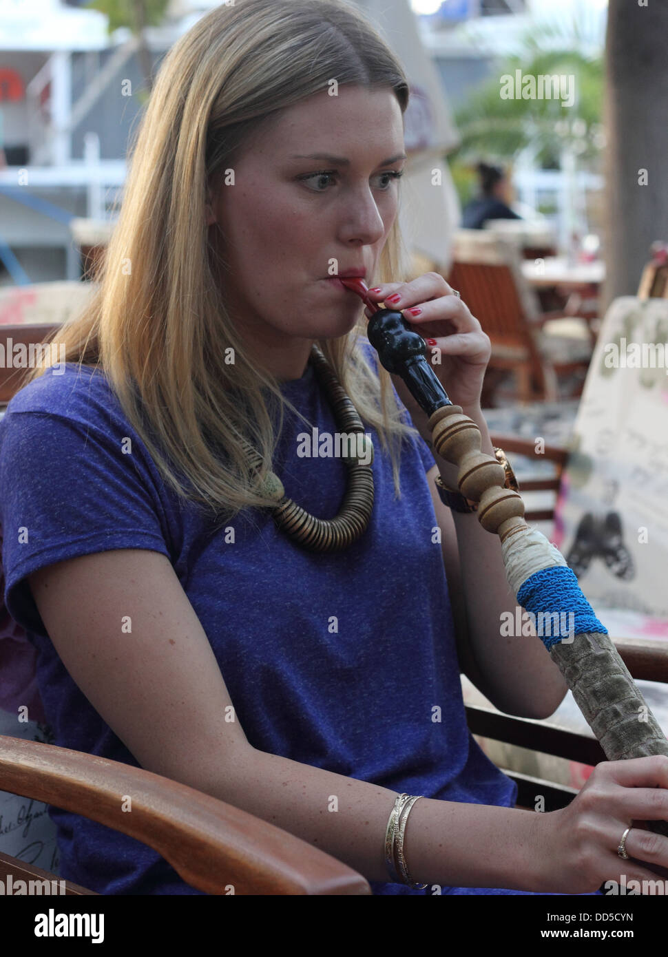 Woman hookah pipe smoking hi-res stock photography and images - Alamy