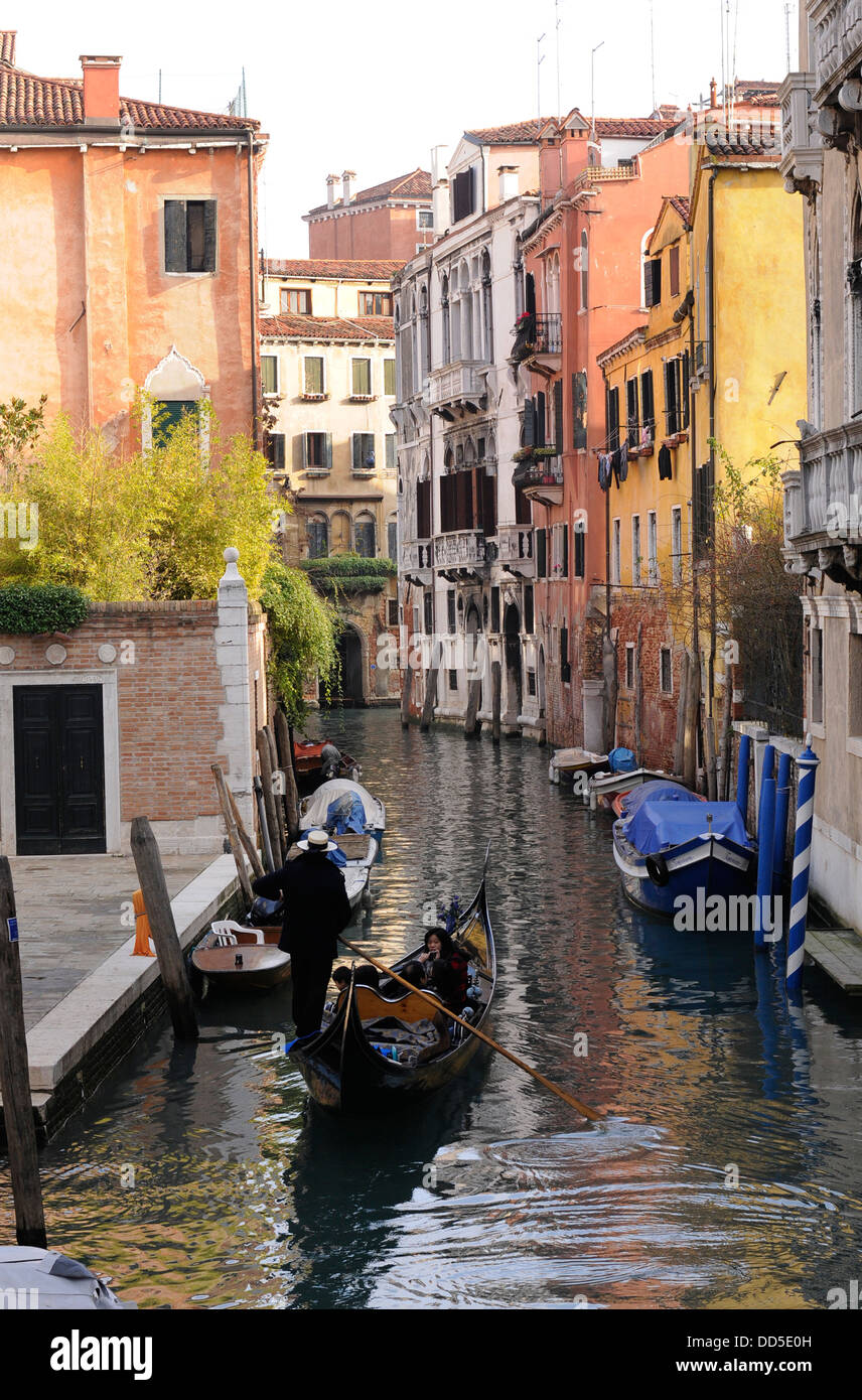 Canal Scene in Venice Italy with boats moored and buildings Stock Photo ...