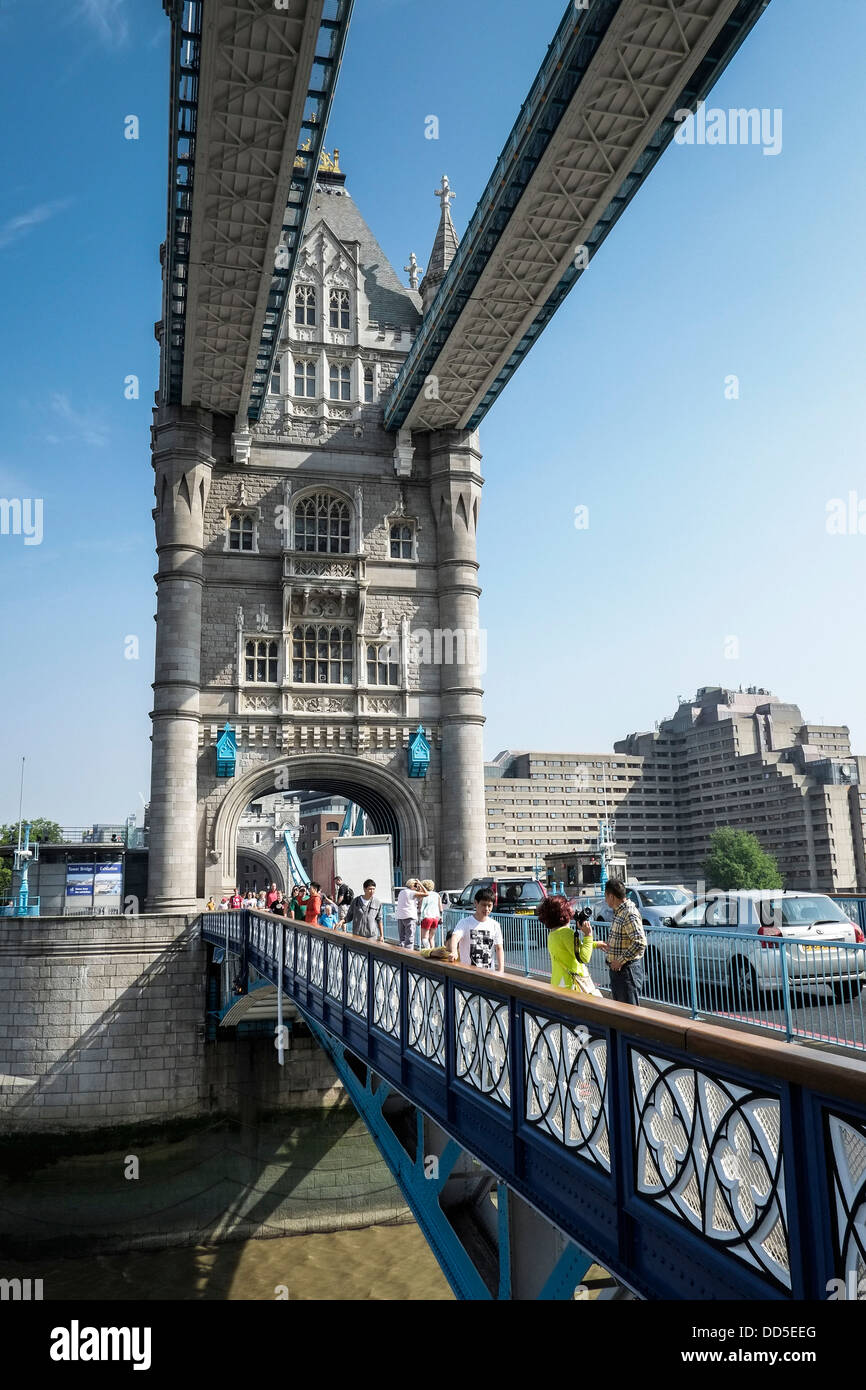 People walking across Tower Bridge Stock Photo - Alamy