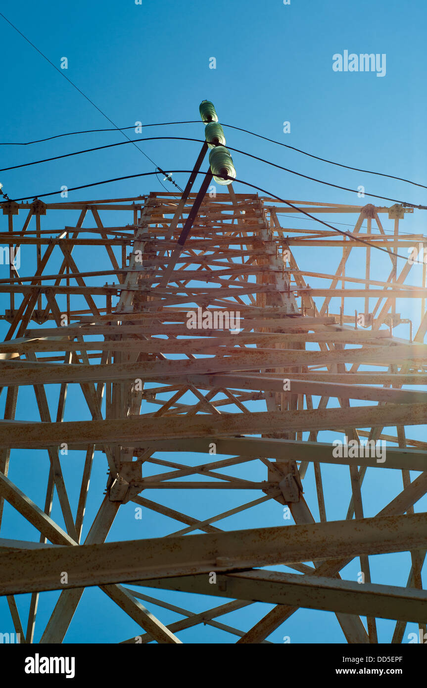 Electric Tower over background of a blue sky. Closeup Stock Photo - Alamy