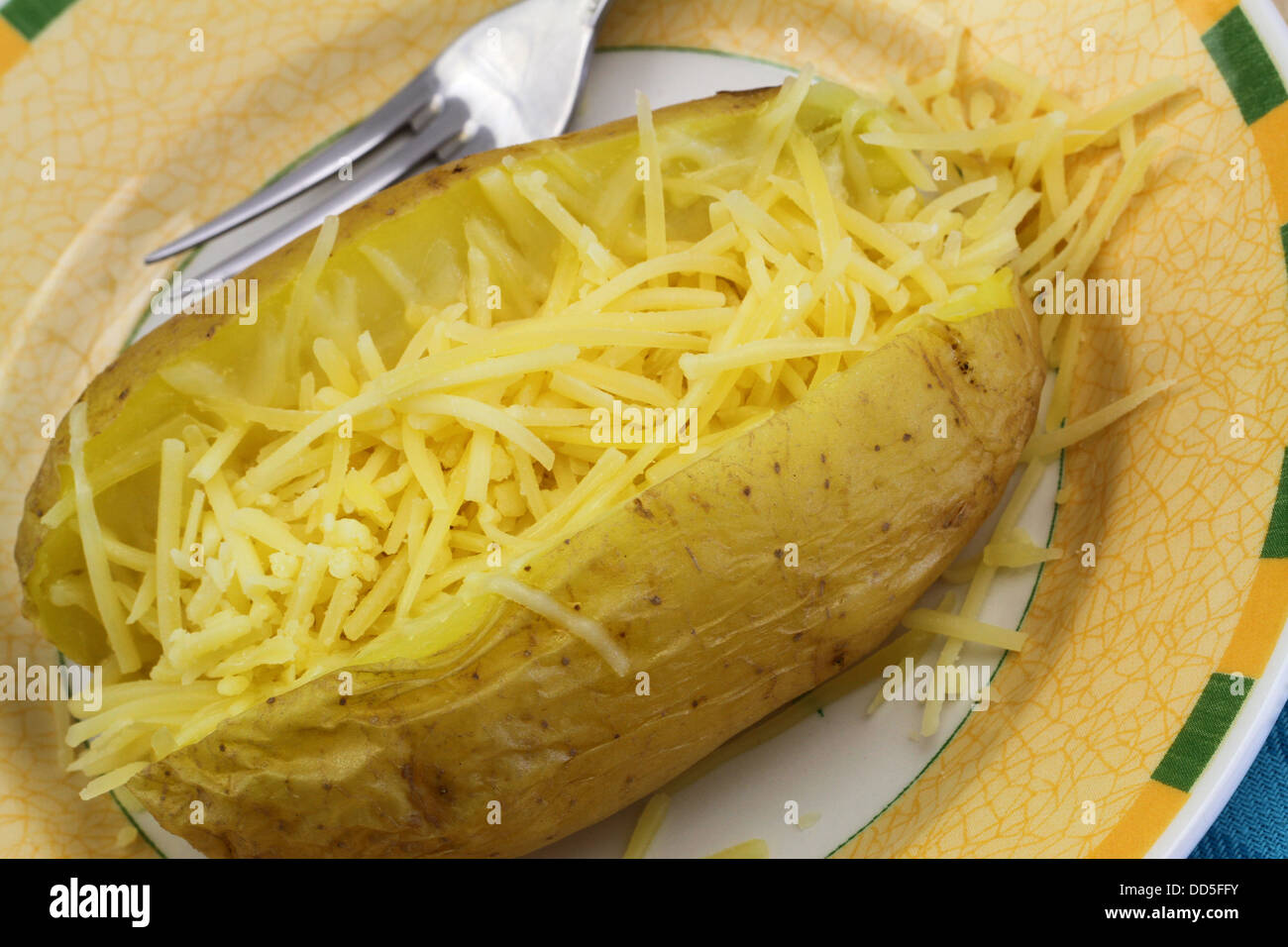 Jacket potato with cheese, close up Stock Photo - Alamy