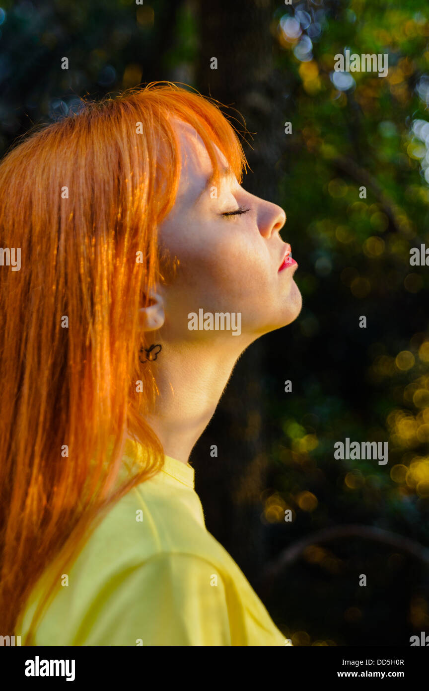 taking a deep breath relaxing with sunlight Stock Photo - Alamy