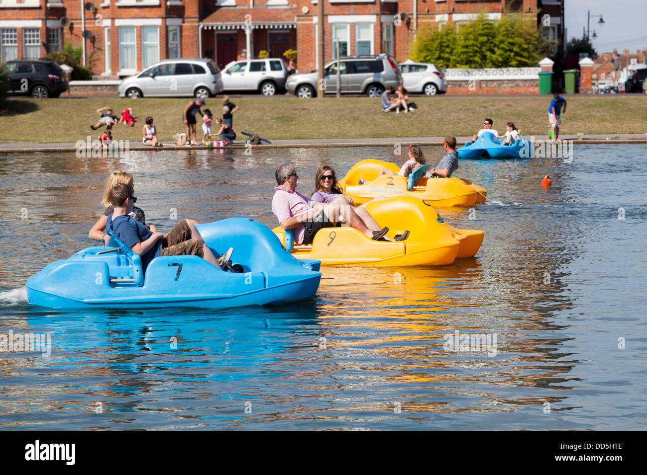 people having fun in Pedaloes on boating lake Stock Photo - Alamy