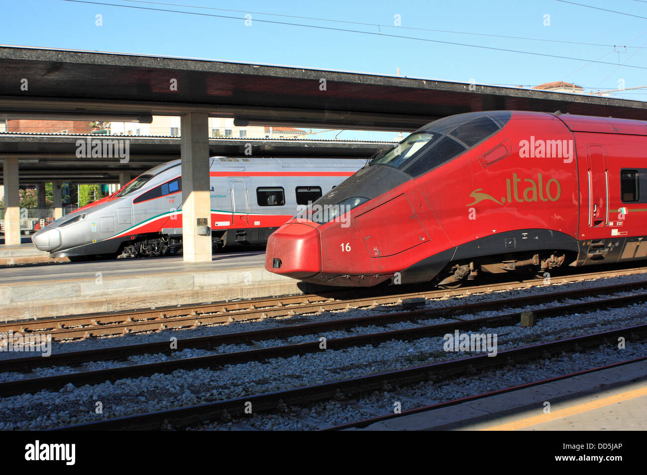 Italian burgundy red high speed train Italo in Venice, together with ...