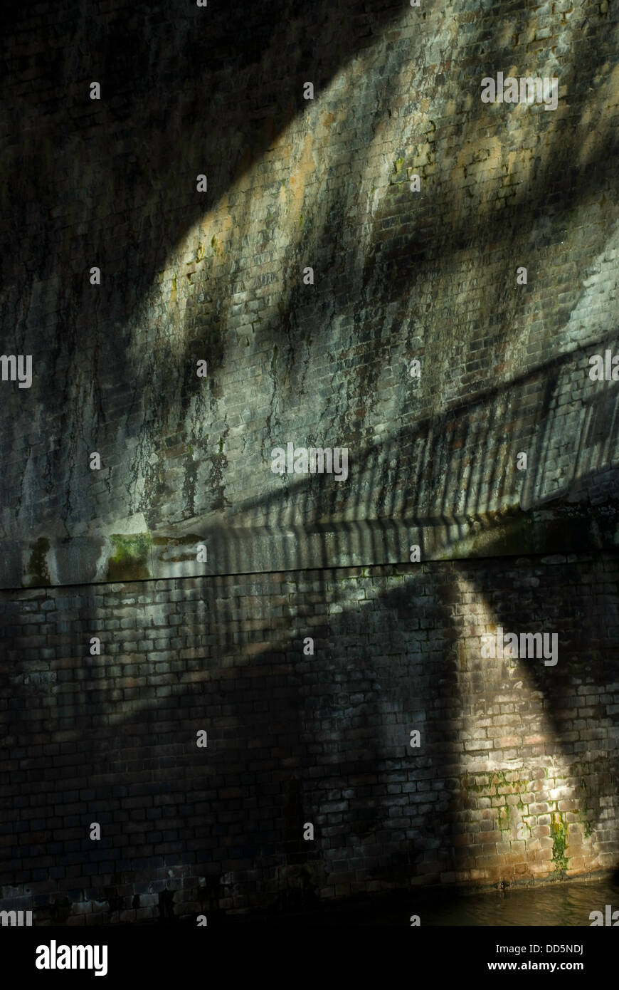 Dark sinister shadows under a bridge over the Nottingham Canal Stock ...