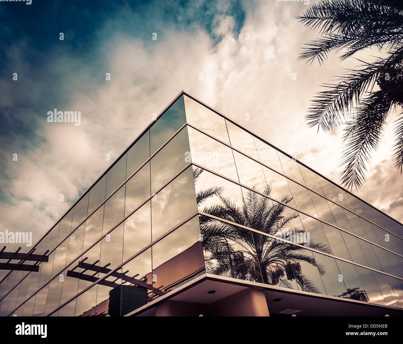 Modern glass office building in warm sunny climate - success Stock ...