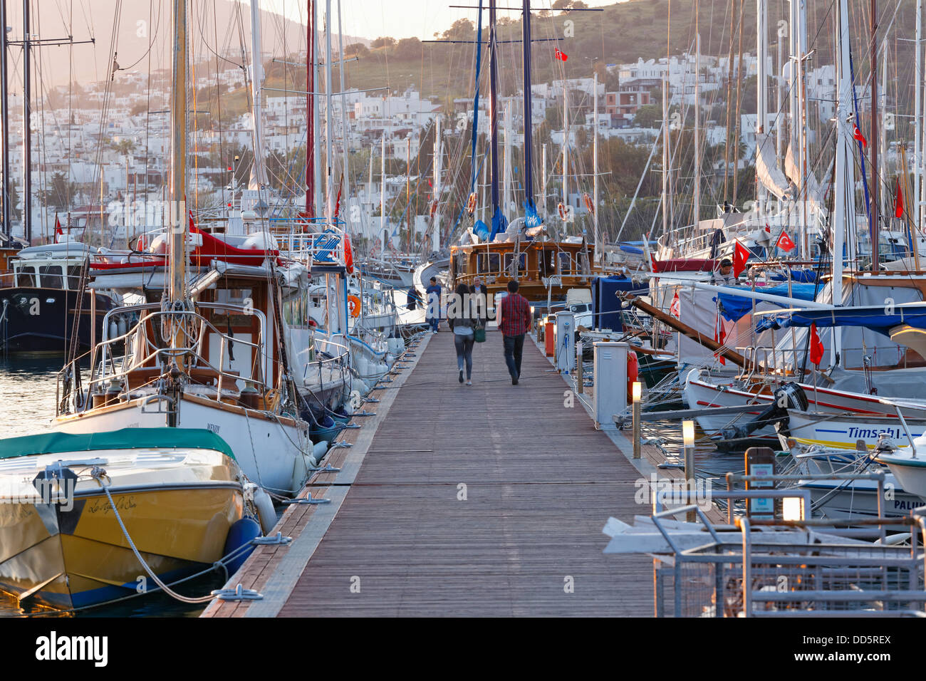 Turkey, Bodrum, People walking through marina Stock Photo - Alamy