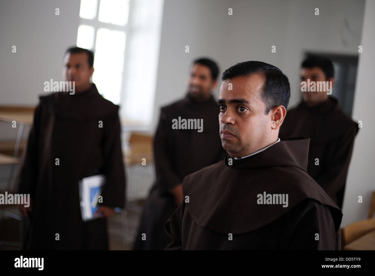 Monks of the Discalced Carmelites are photographes in the Michaelsberg ...