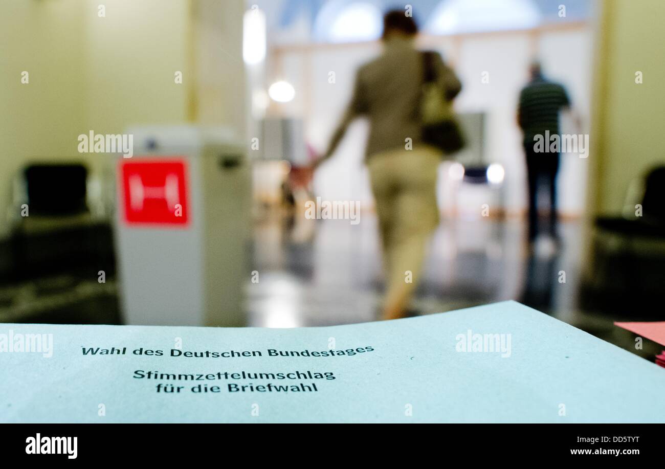A ballot paper envelope for postal voting is seen in a polling station ...