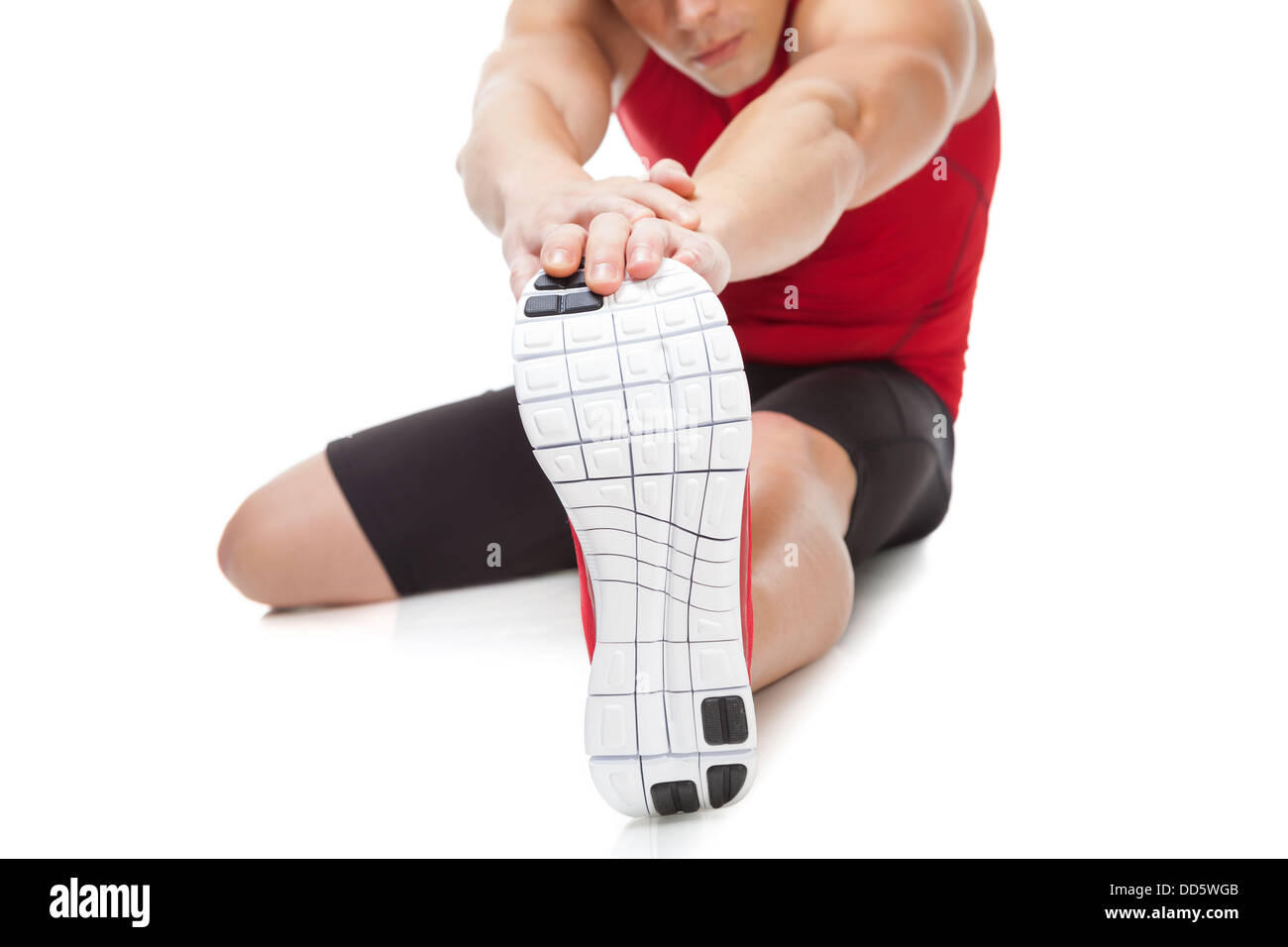 Stretching after exercise Stock Photo - Alamy