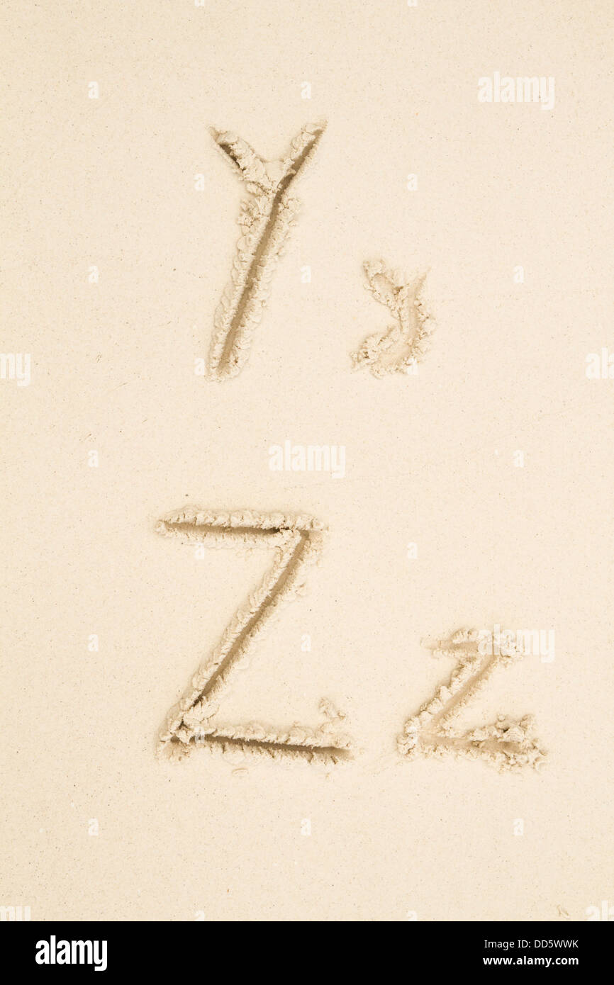 alphabet in sand Stock Photo - Alamy