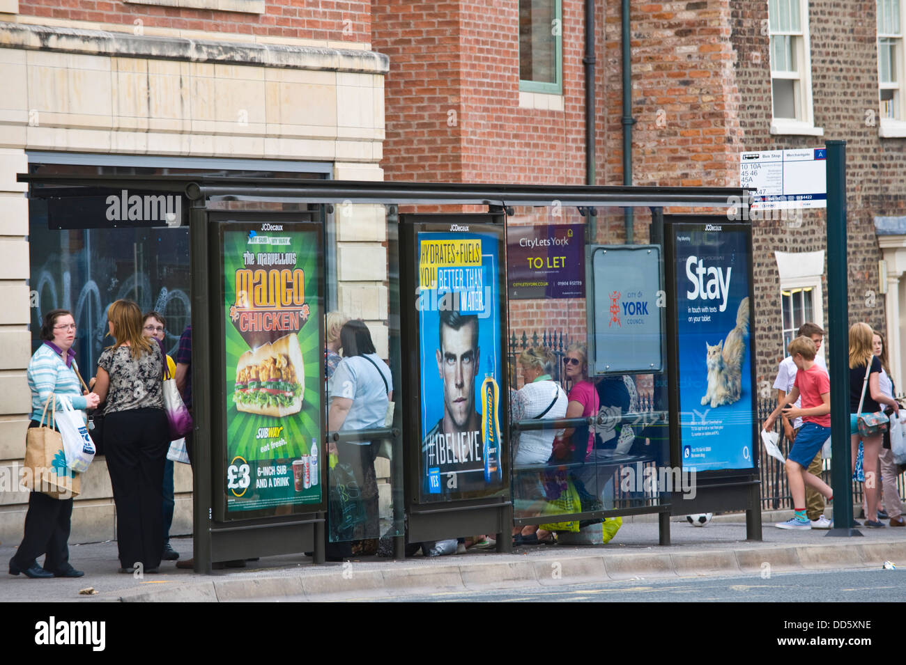 Bus Stop with advertising on shelter in city of York North Yorkshire ...