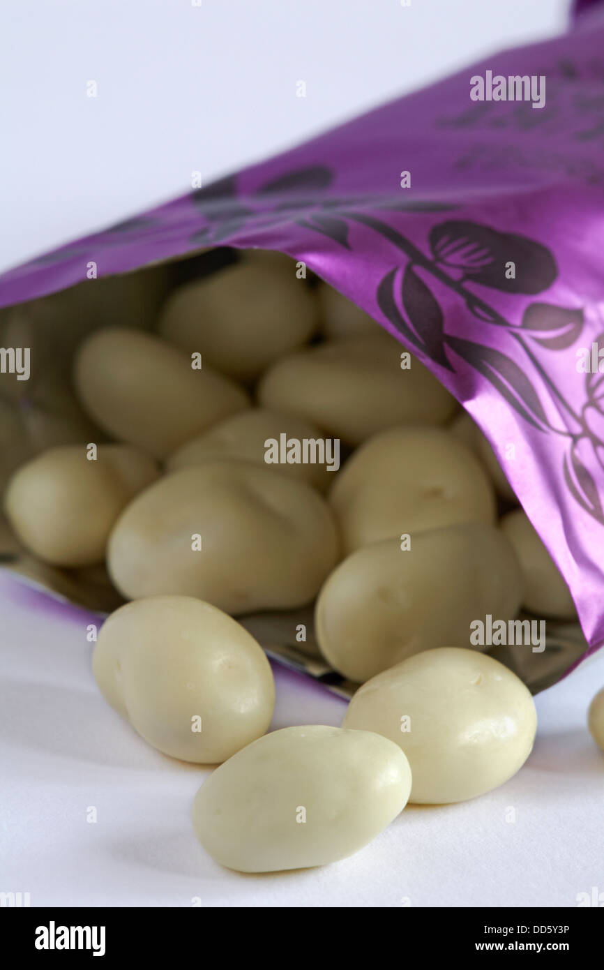 packet of Marks & Spencer Yogurt Coated Raisins undone to show contents ...