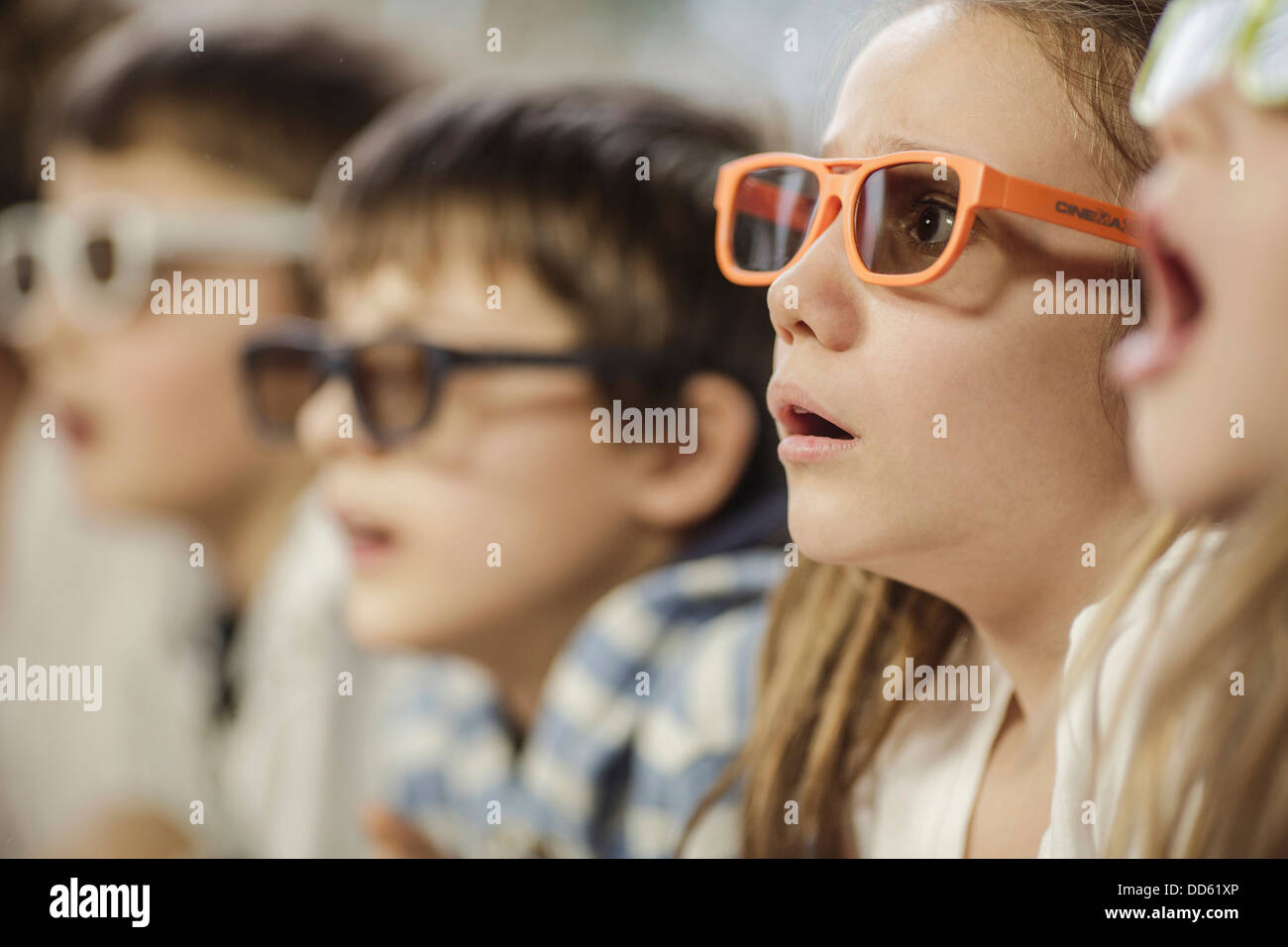 Children watching tv hi-res stock photography and images - Alamy