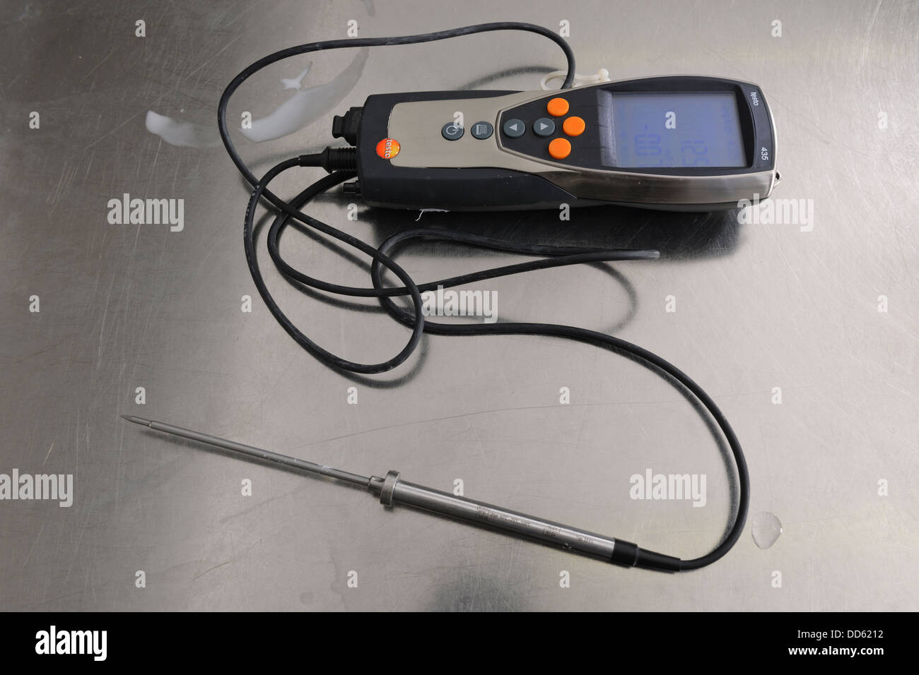 Germany, Baden Wuerttemberg, Temperature measuring device in cheese ...