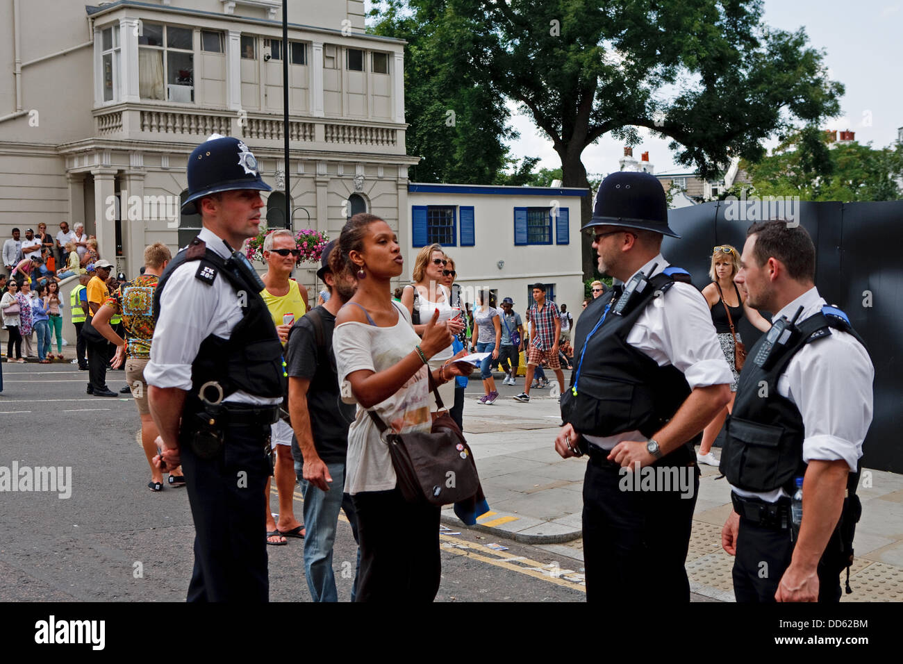 Notting Hill,UK,26th August 2013,Police speak to a member of the public ...