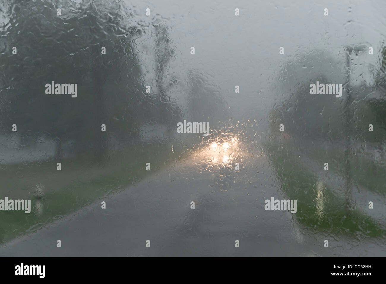 Raindrop on glass front car hi-res stock photography and images - Alamy