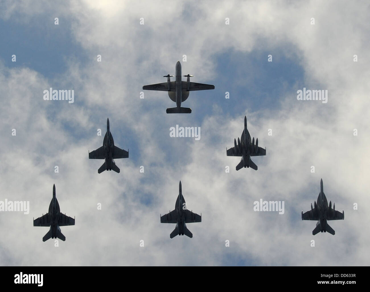 U.S. Navy aircraft assigned to Carrier Air Wing (CVW) 5 fly in ...