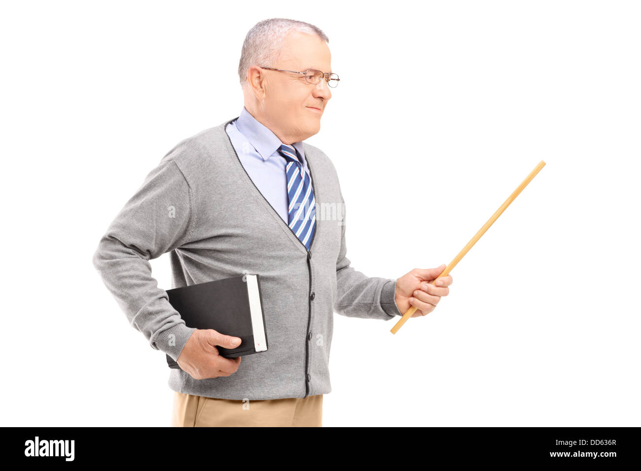 Male teacher holding a wand and a book Stock Photo - Alamy