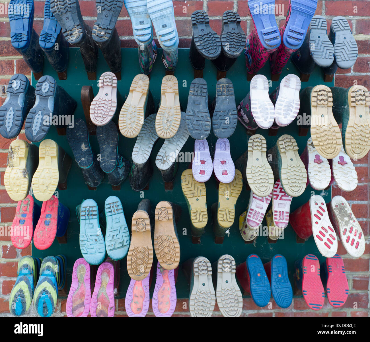A rack of Wellington boots at Hoath Primary School Stock Photo - Alamy