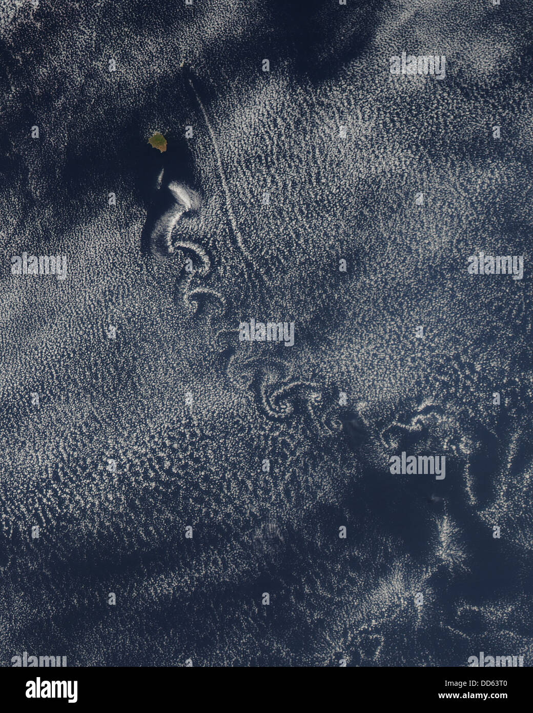 A swirl of clouds over the Pacific Ocean, captured by NASA's Earth ...