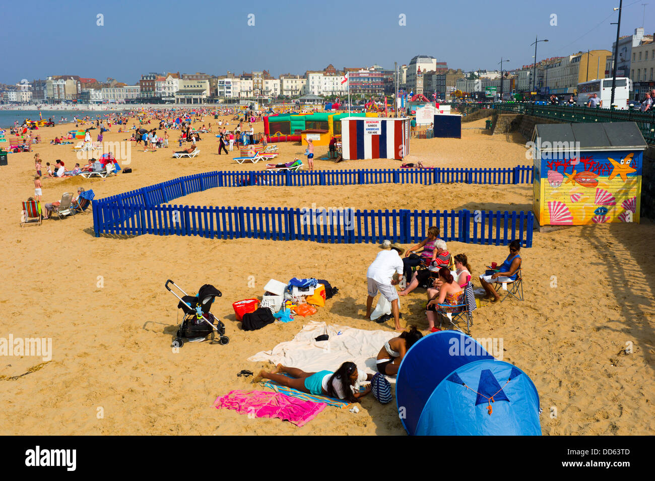 People enjoying the Sun on Margate Seafront Stock Photo - Alamy