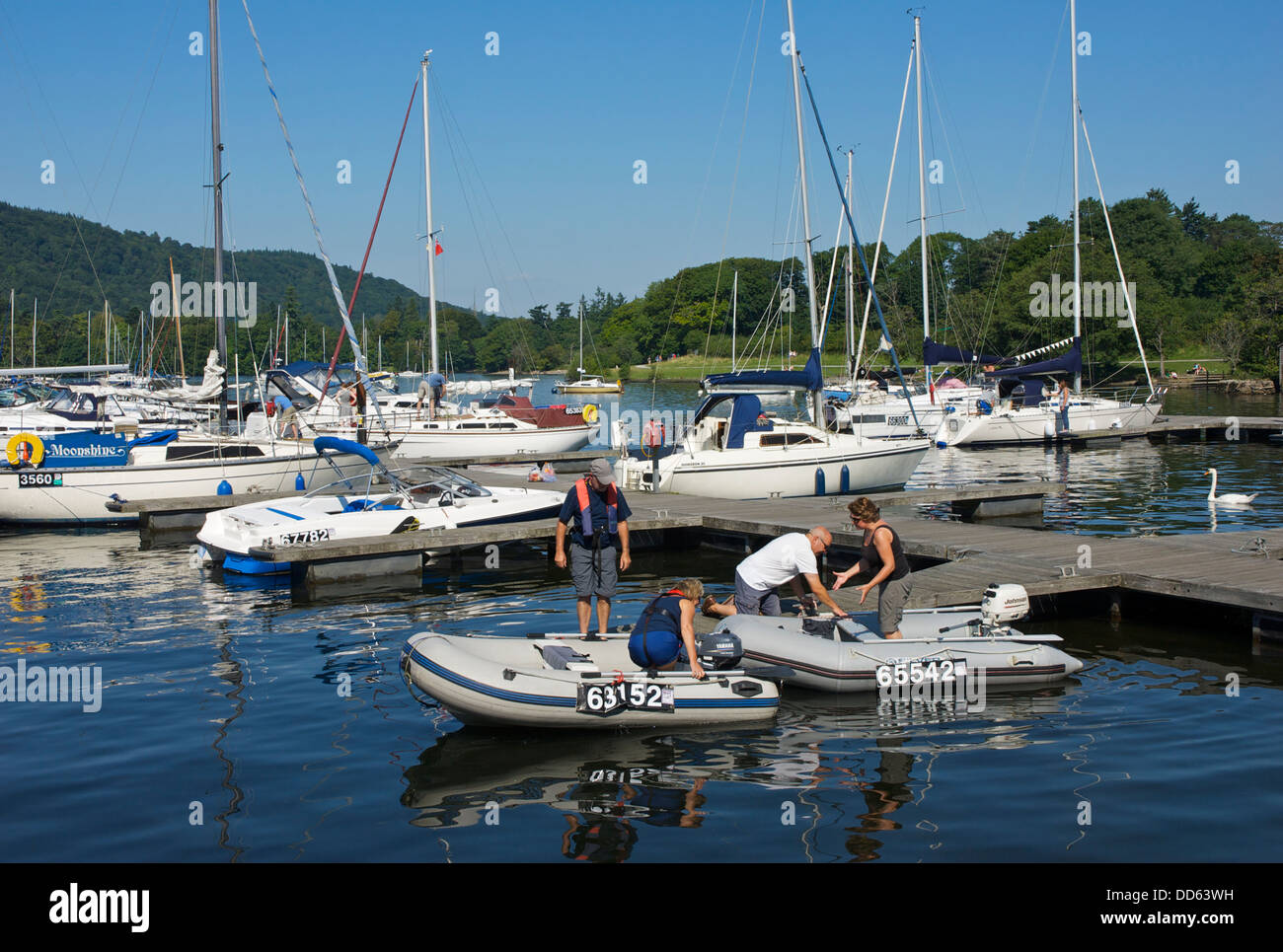 Messing about in boats at Ferry Nab, Lake Windermere, Lake District ...