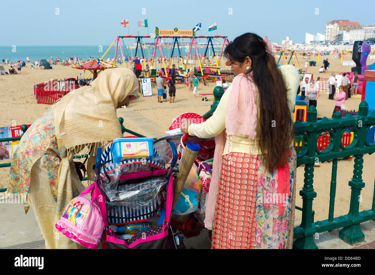 People enjoying the Sun on Margate Seafront Stock Photo - Alamy