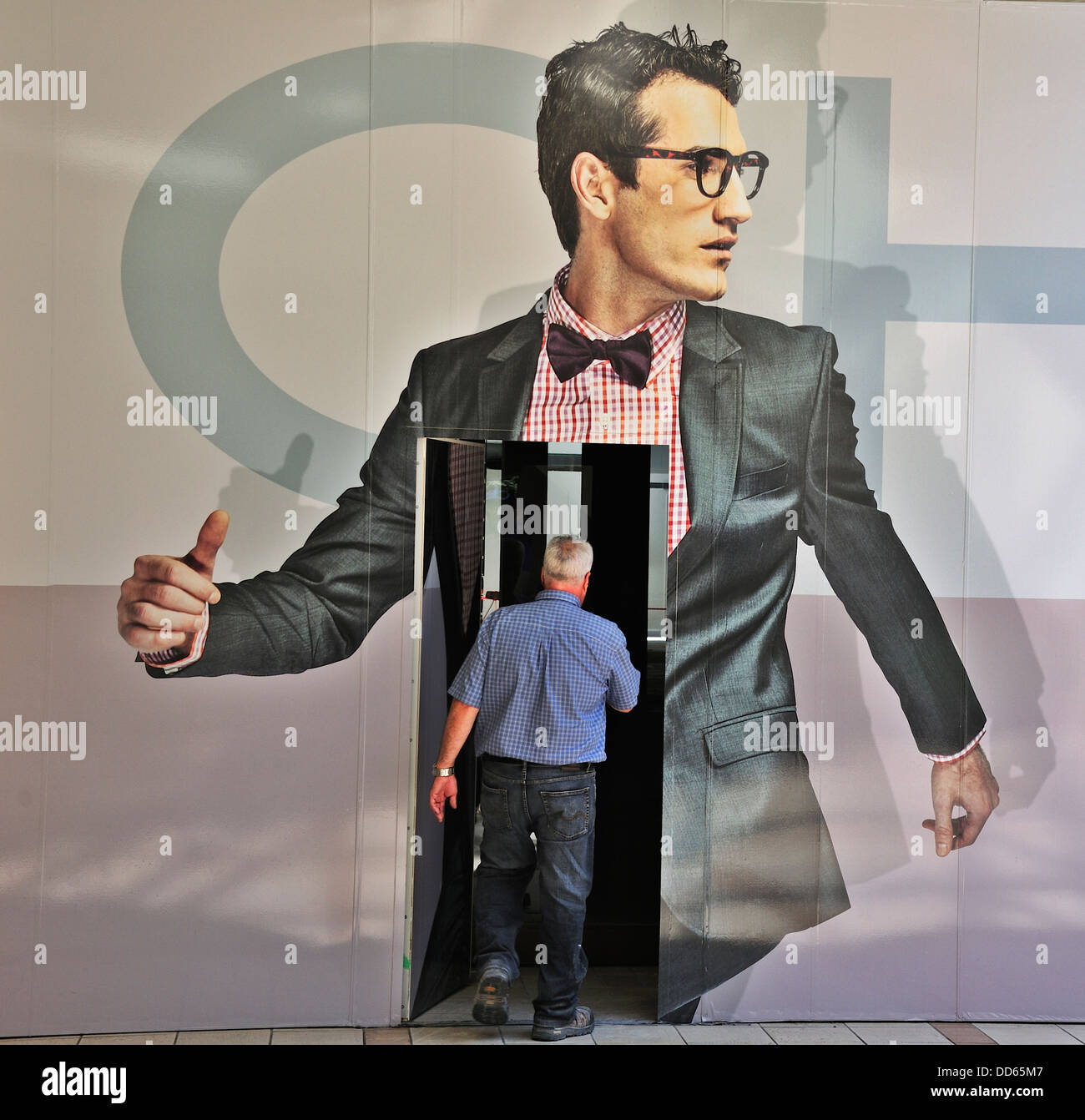 Door in hoarding hi-res stock photography and images - Alamy