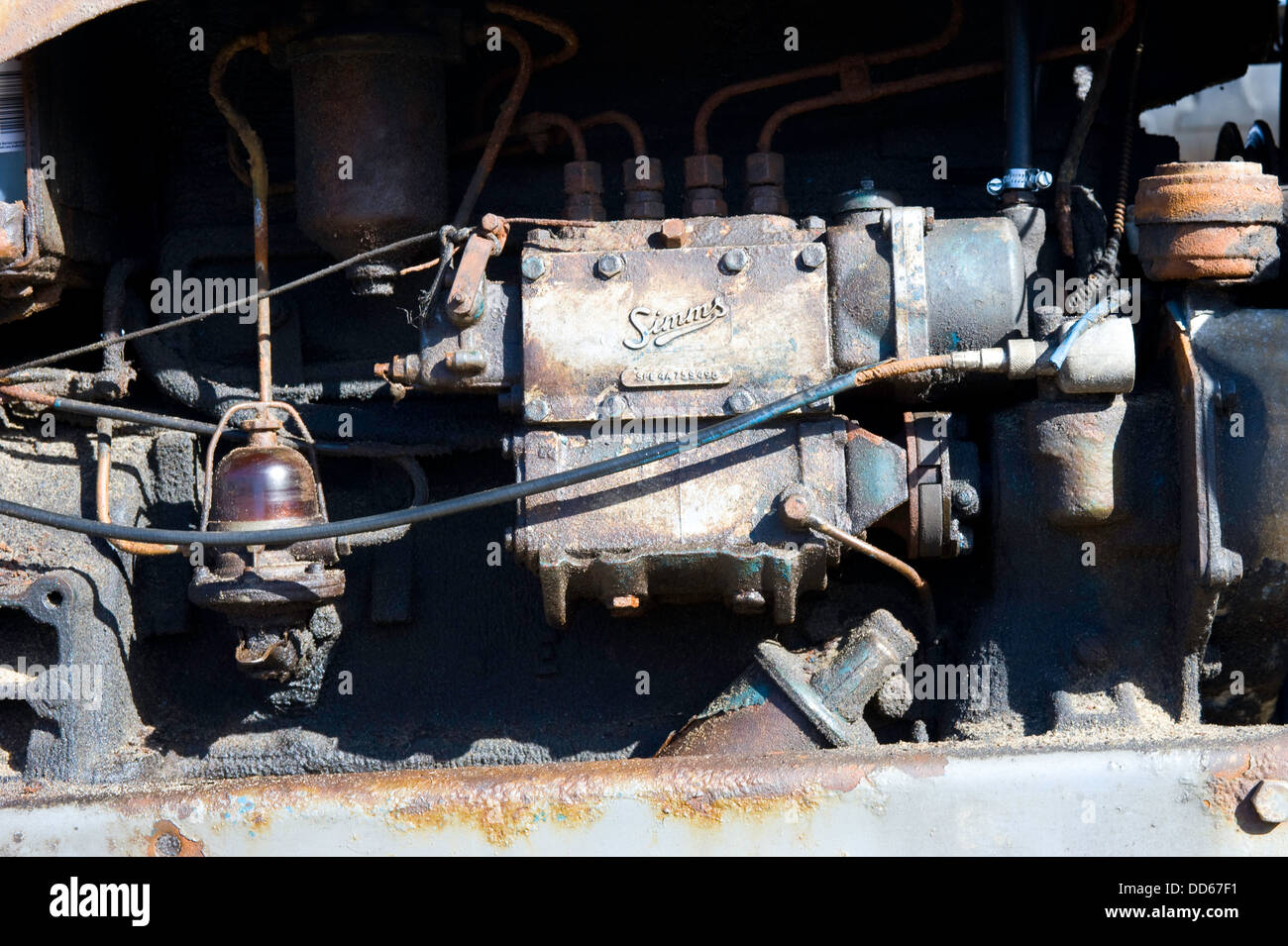 Close up of the engine compartment of an ancient tractor used for ...