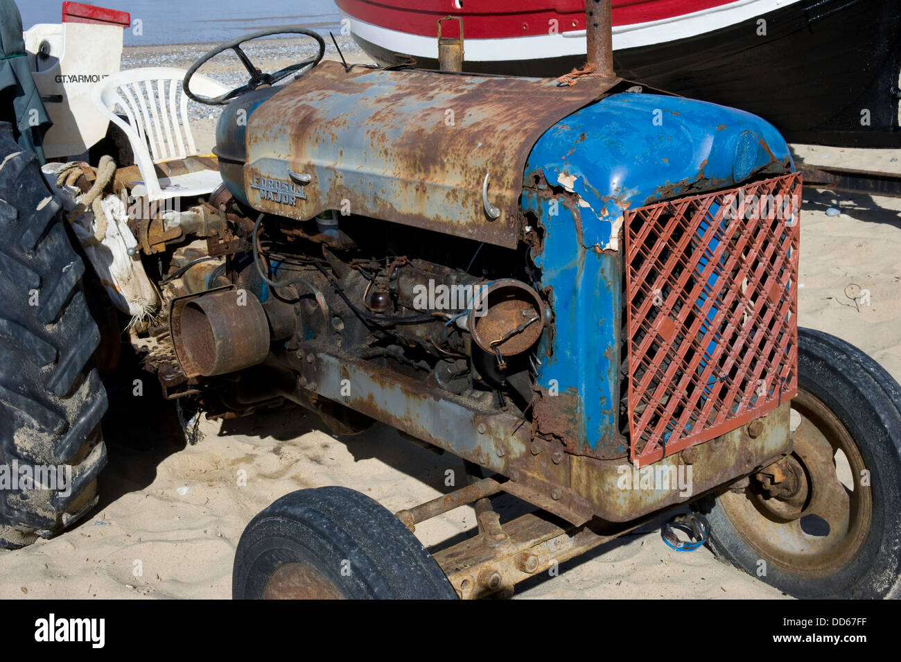 Ancient tractors used for towing fishing boats up and down the sandy ...