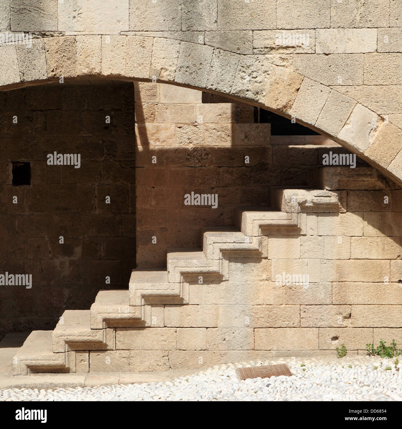 Steps and an arch on a medieval building by the Argyrokastron square in ...
