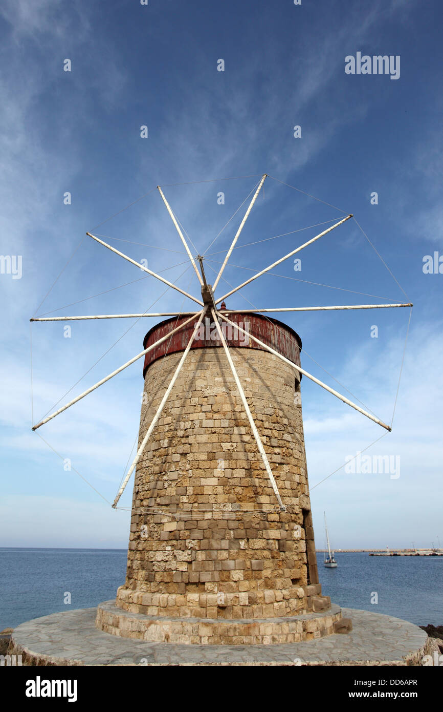 A medieval windmill at Mandraki harbour at Rhodes City, Rhodes, Greece ...