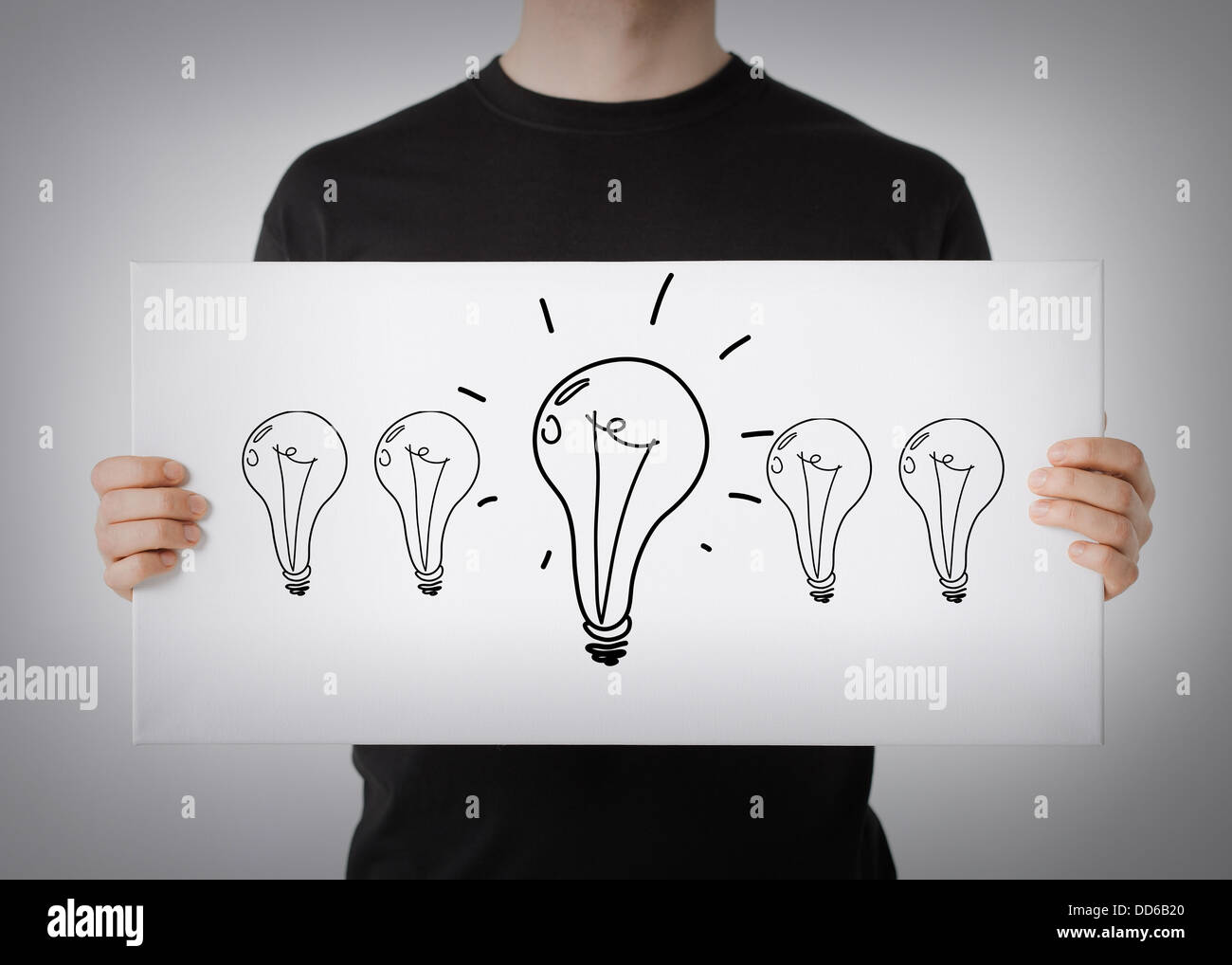 man showing picture with light bulbs Stock Photo - Alamy