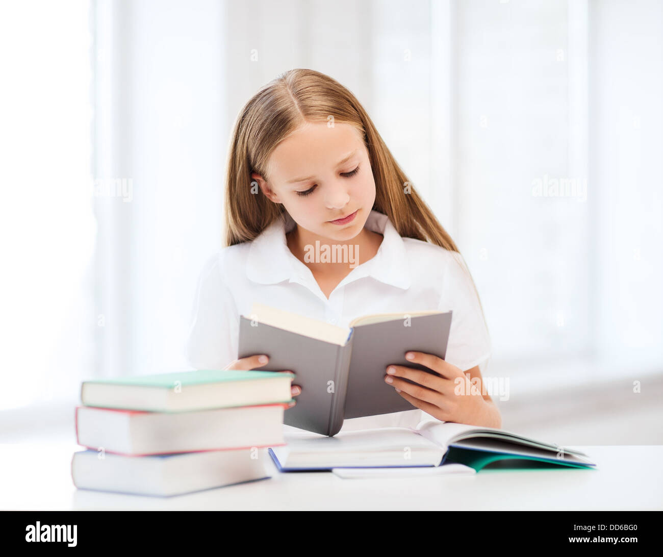 student girl studying at school Stock Photo - Alamy