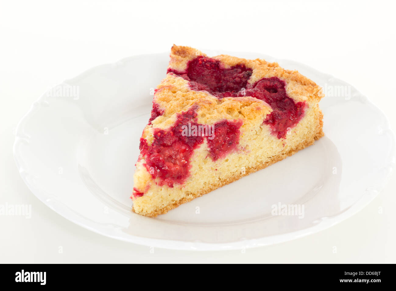 Eating delicious slice of raspberry cake Stock Photo - Alamy