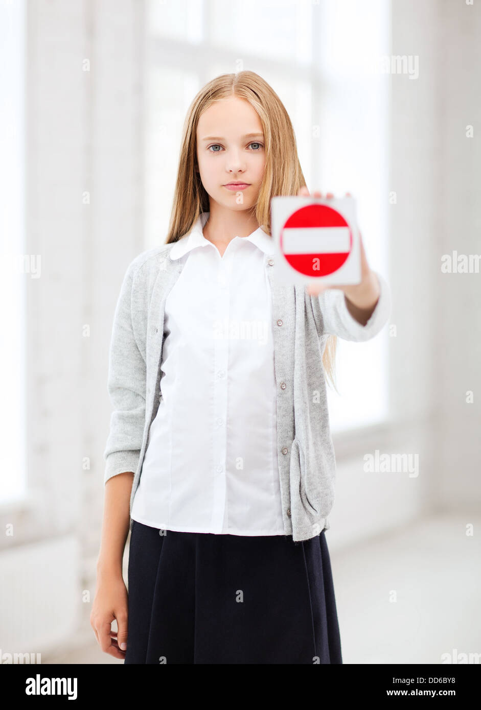girl showing stop sign Stock Photo - Alamy