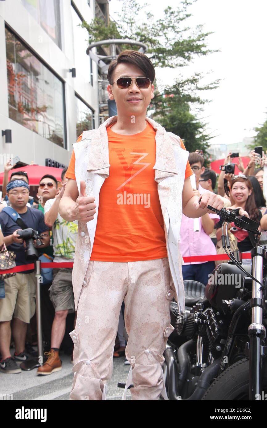 Taipei, China. 25th Aug, 2013. Singer David Tao holds an autograph ...