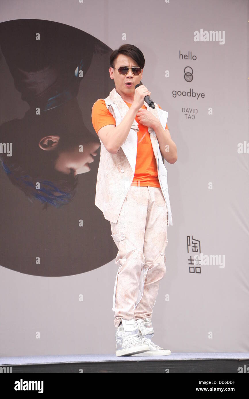 Taipei, China. 25th Aug, 2013. Singer David Tao holds an autograph ...