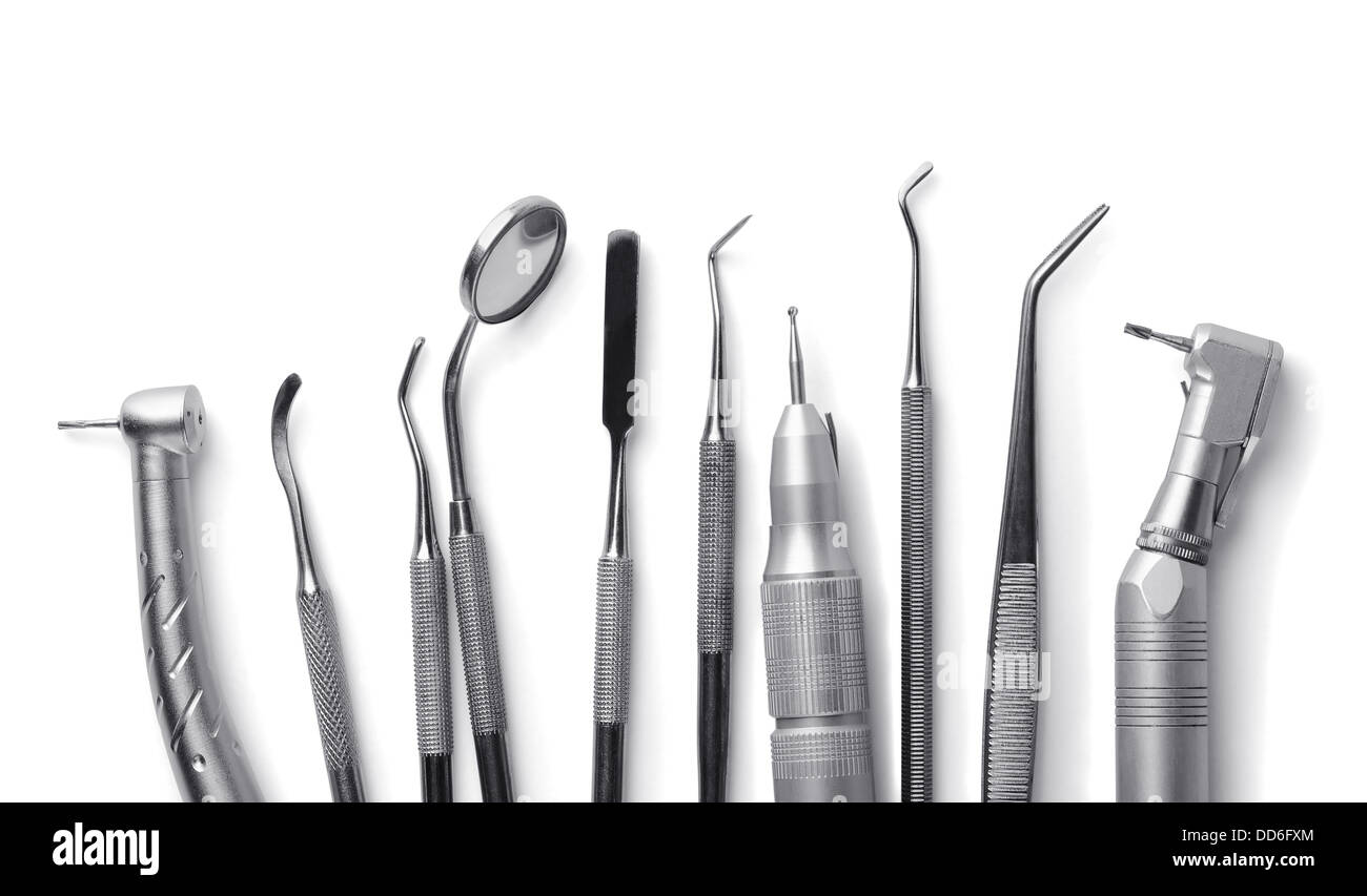 Row of various dental tools isolated on white Stock Photo - Alamy