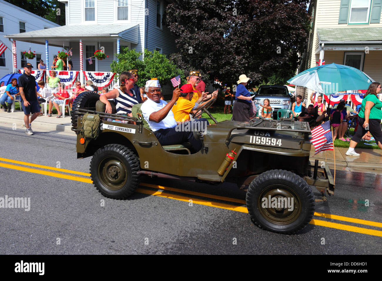 African American soldier in army jeep taking part in 4th of July ...